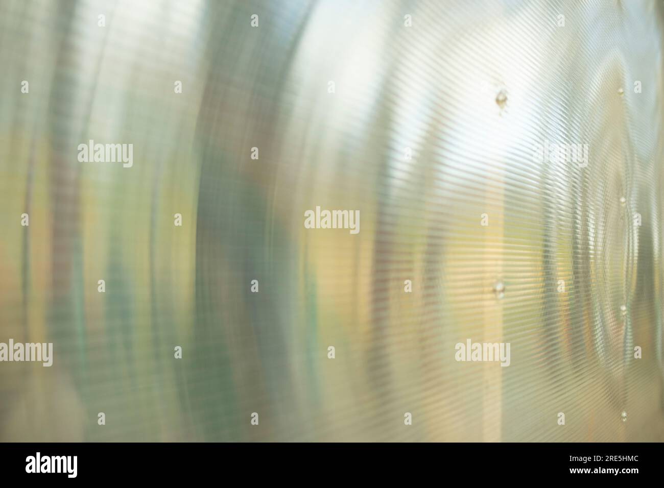 Reflection in plastic surface. Distorted reflection. Transparent ...