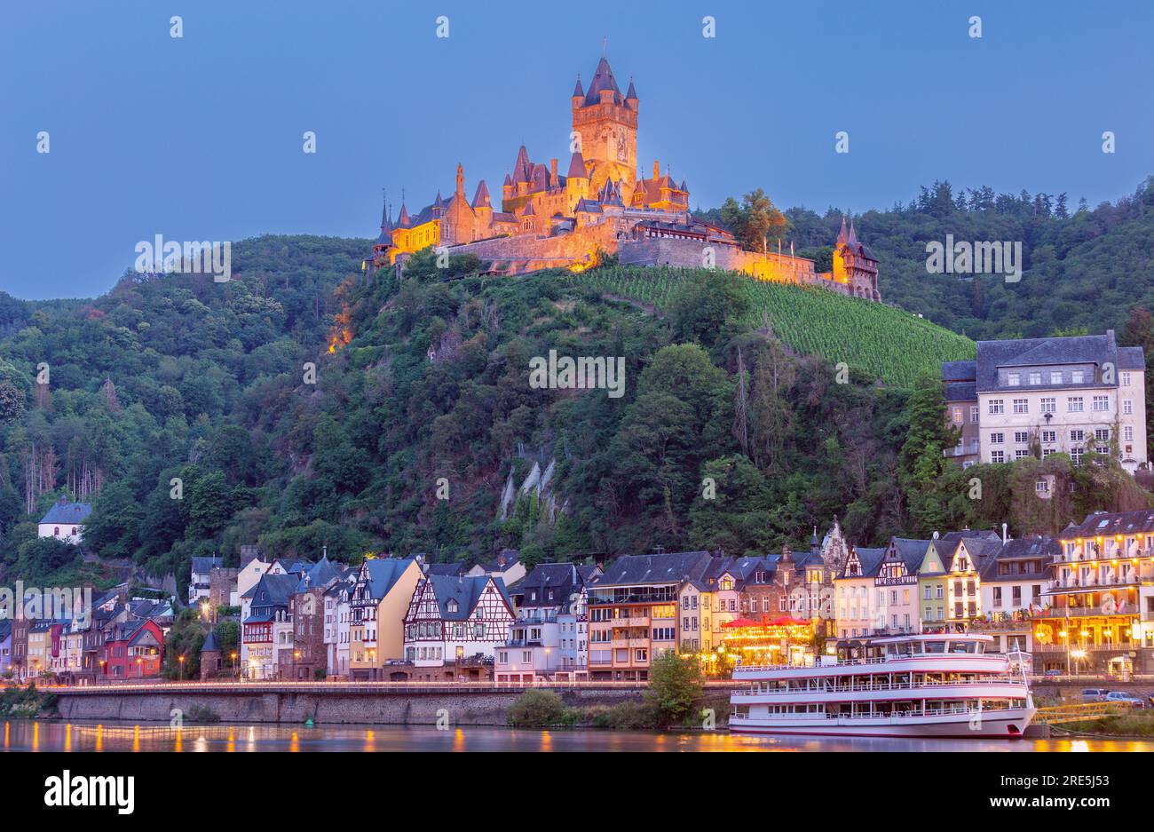 Medieval European fortress Reichsburg on a hill with vineyards at ...
