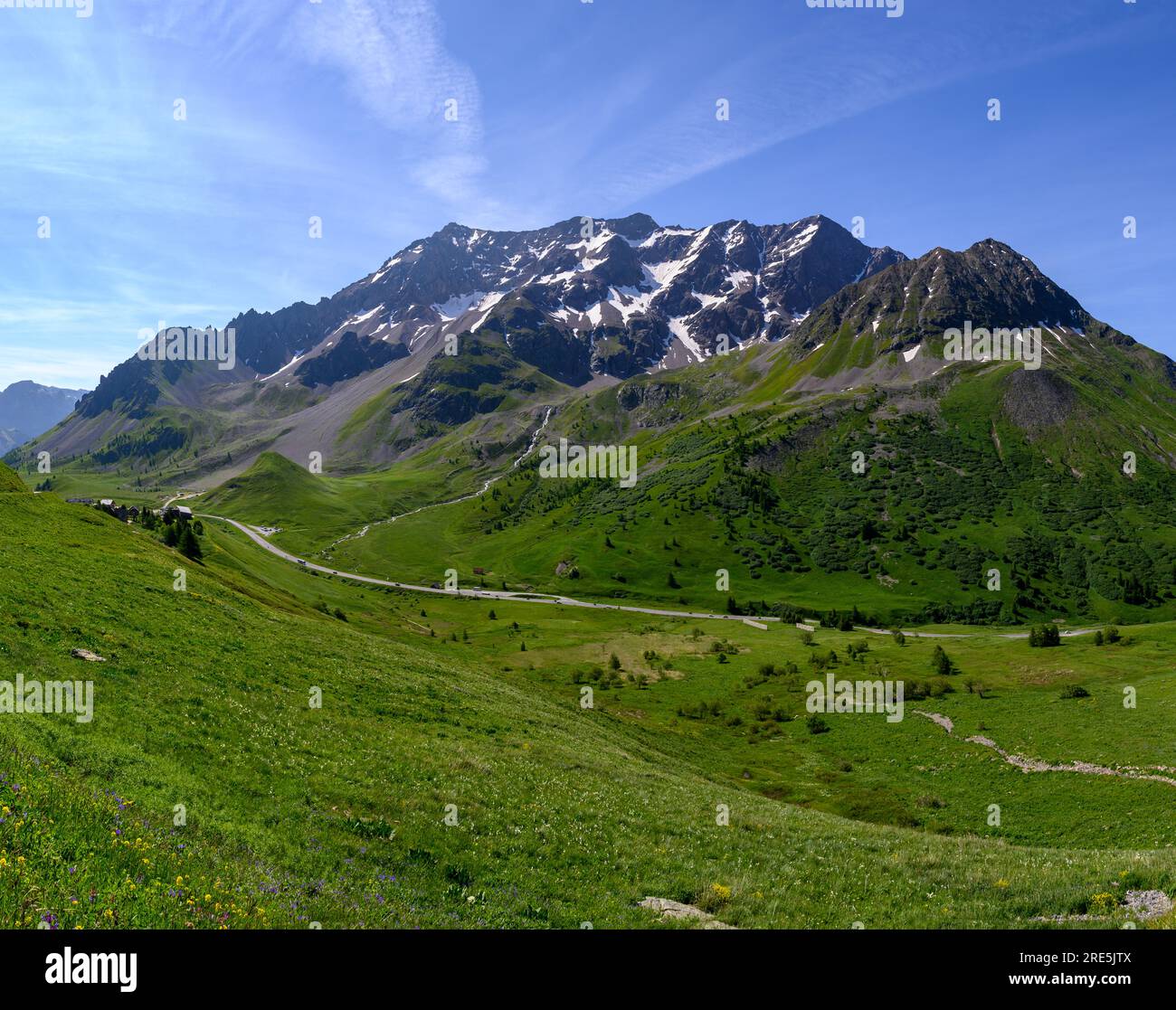 Mountains and green alpine meadows views near Col du Lautaret, Massif ...