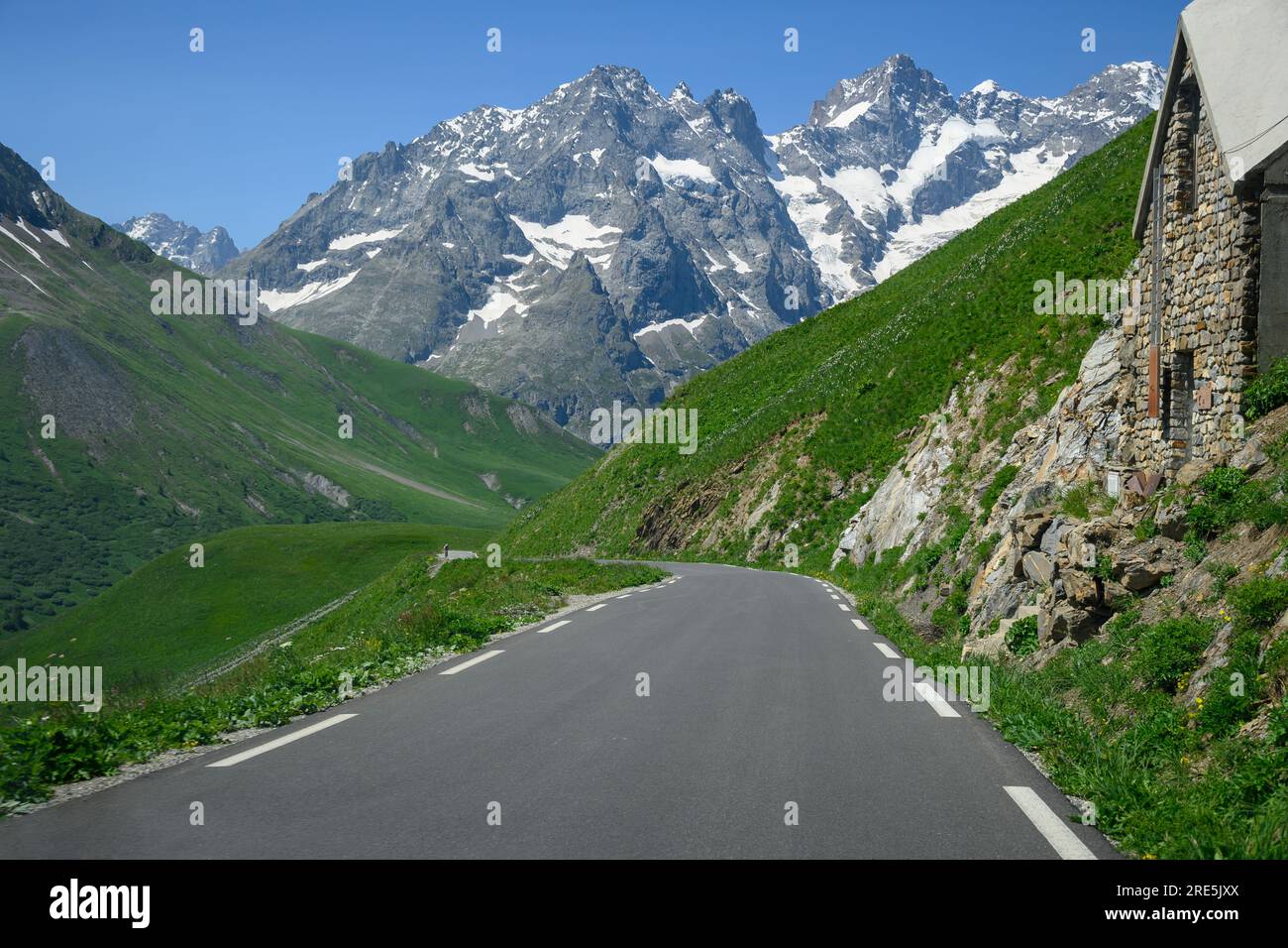 Narrow mountains road from Col de Lautaret to Col du Calibier ...