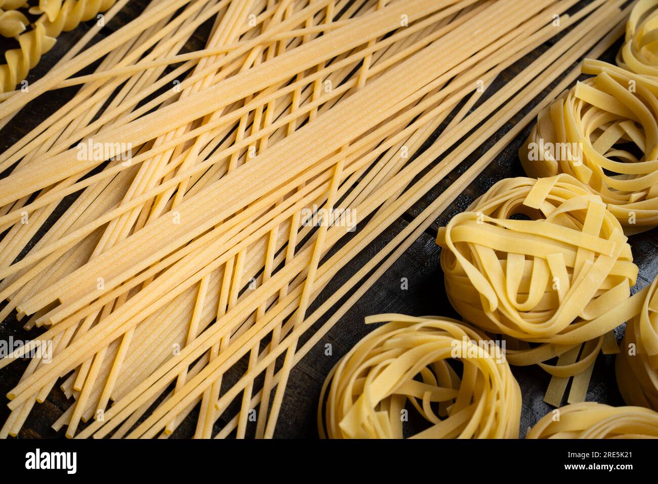 Pasta shapes, spaghetti and tagliatelle, Italian cuisine ingredients on ...