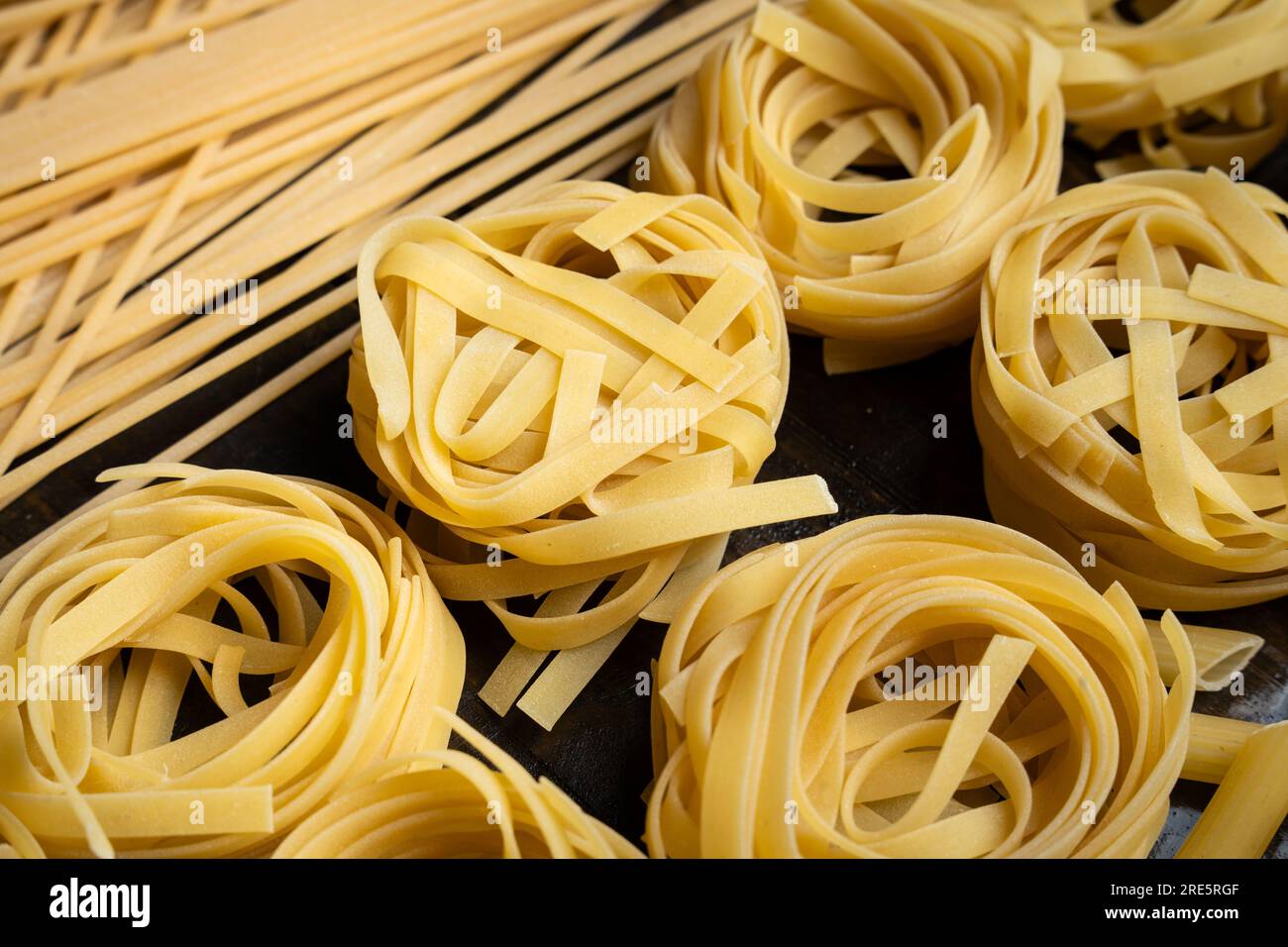 Pasta shapes, spaghetti and tagliatelle, Italian cuisine ingredients on ...