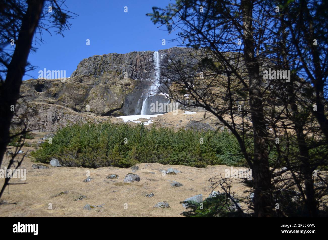 Water flowing over a large rock precipice on Snaeefellsnes Peninsula ...