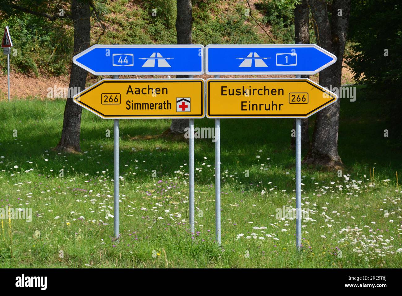 Traffic signs - Left towards Aachen, right towards Cologne Stock Photo ...