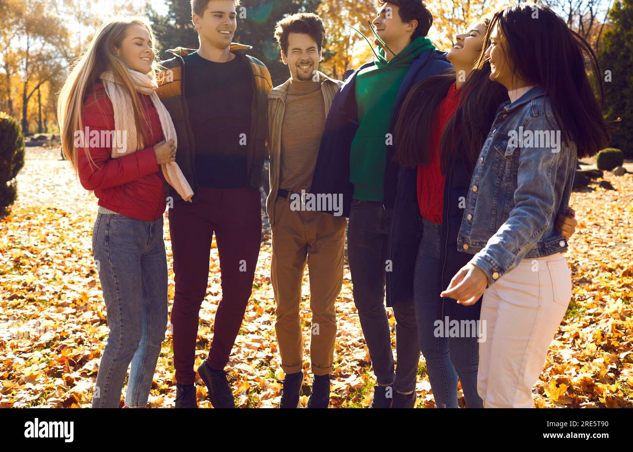 Group friends adult hug autumn hi-res stock photography and images - Alamy