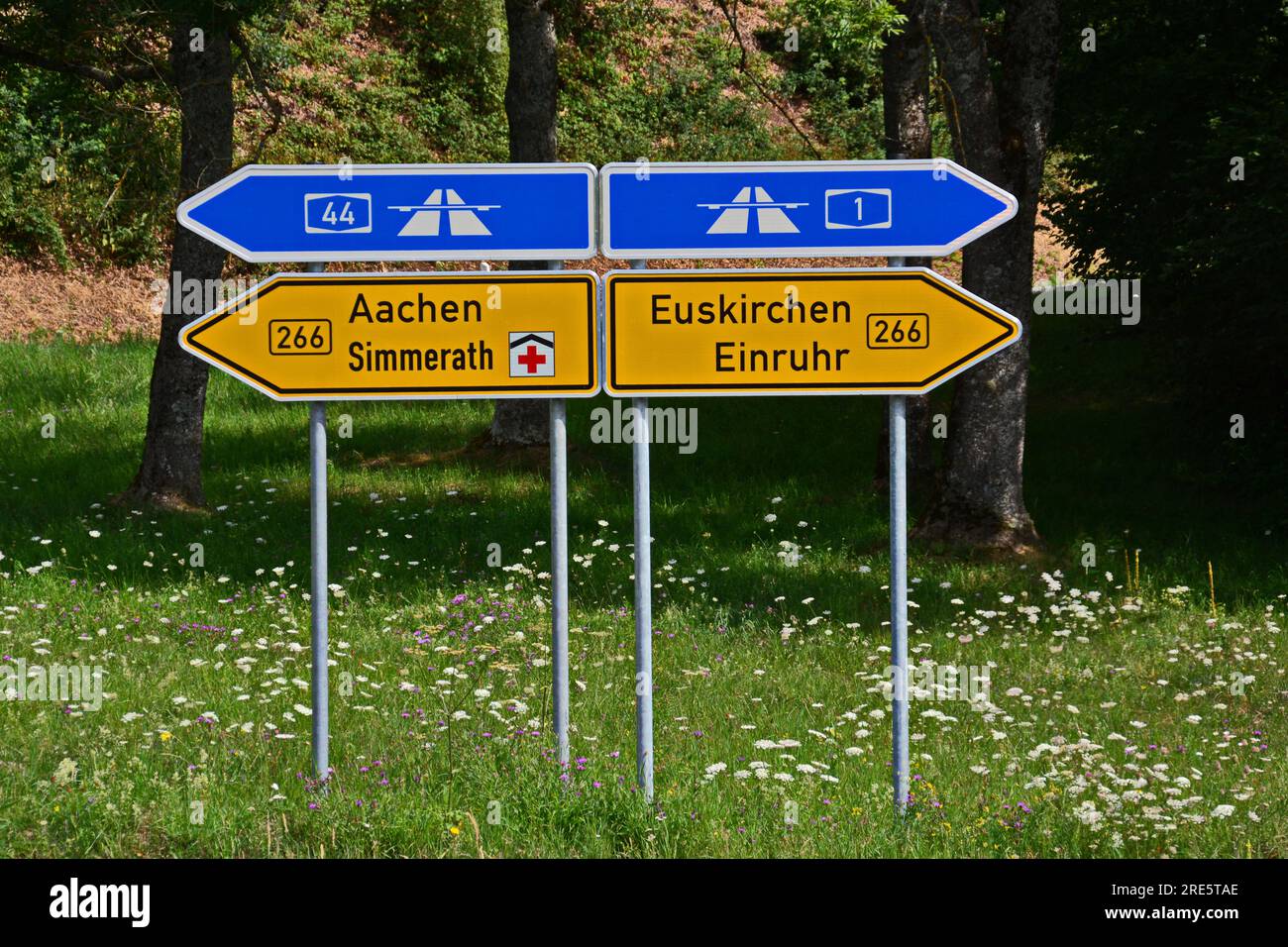 Traffic signs - Left towards Aachen, right towards Cologne Stock Photo ...