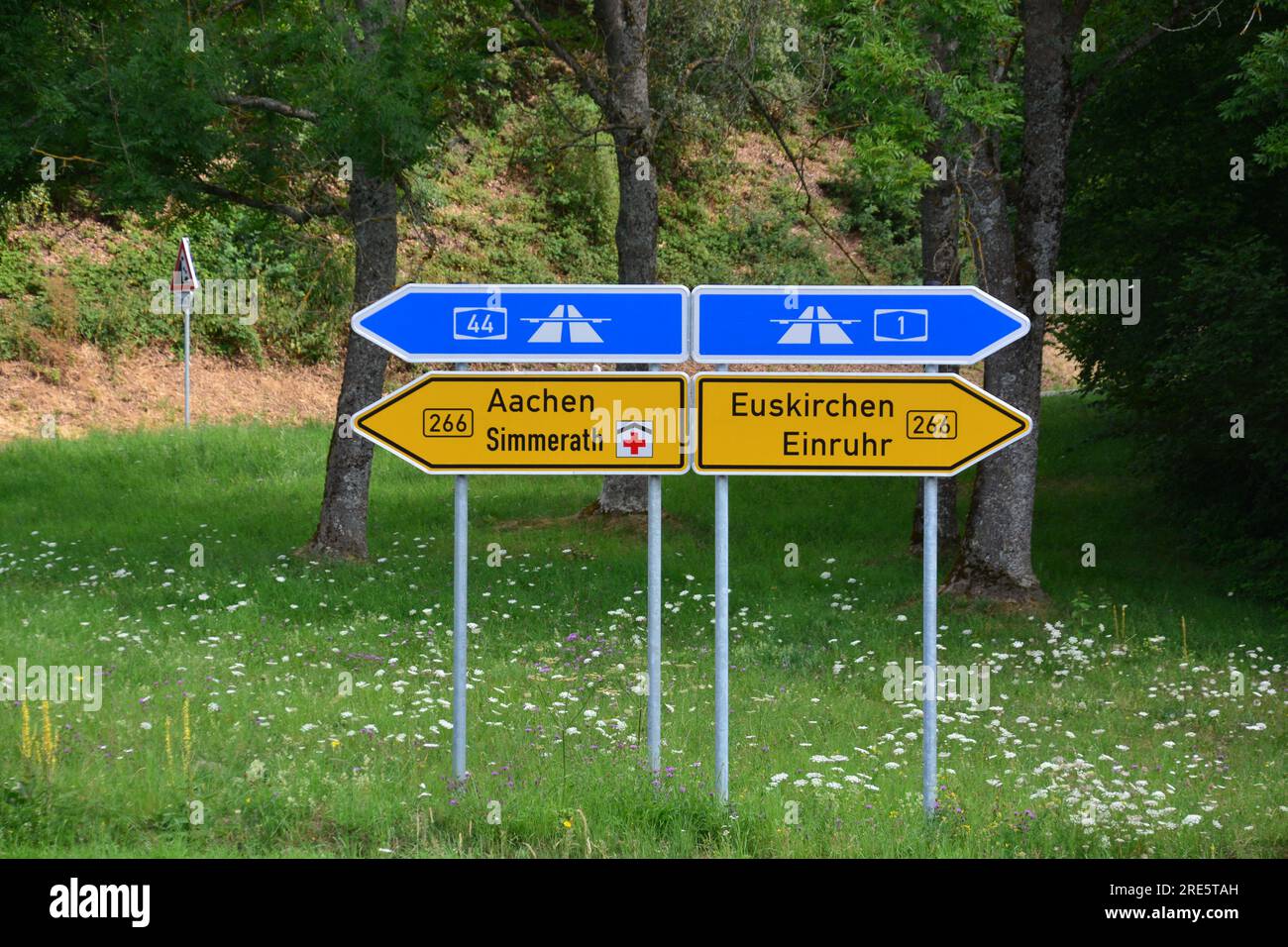 Traffic signs - Left towards Aachen, right towards Cologne Stock Photo ...
