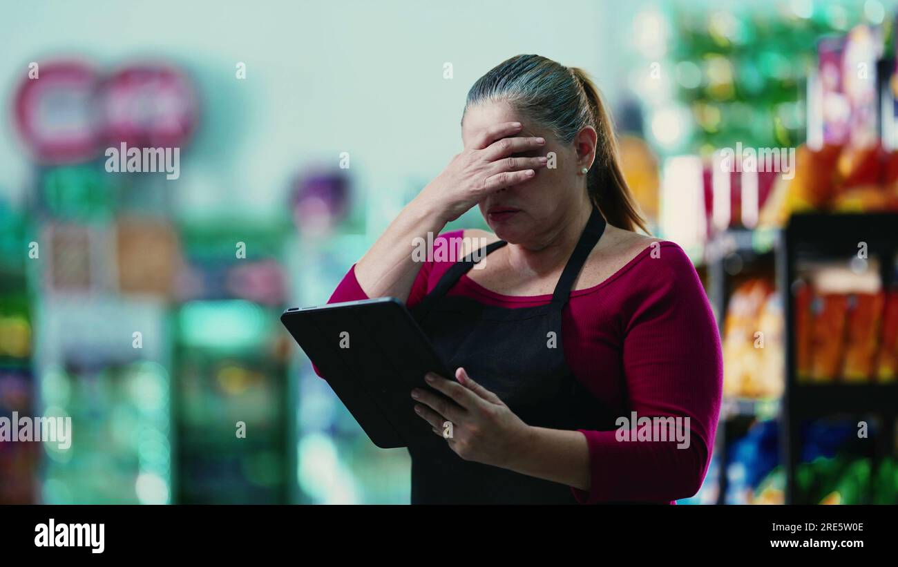 Stressed female entrepreneur owner of small business struggling with ...