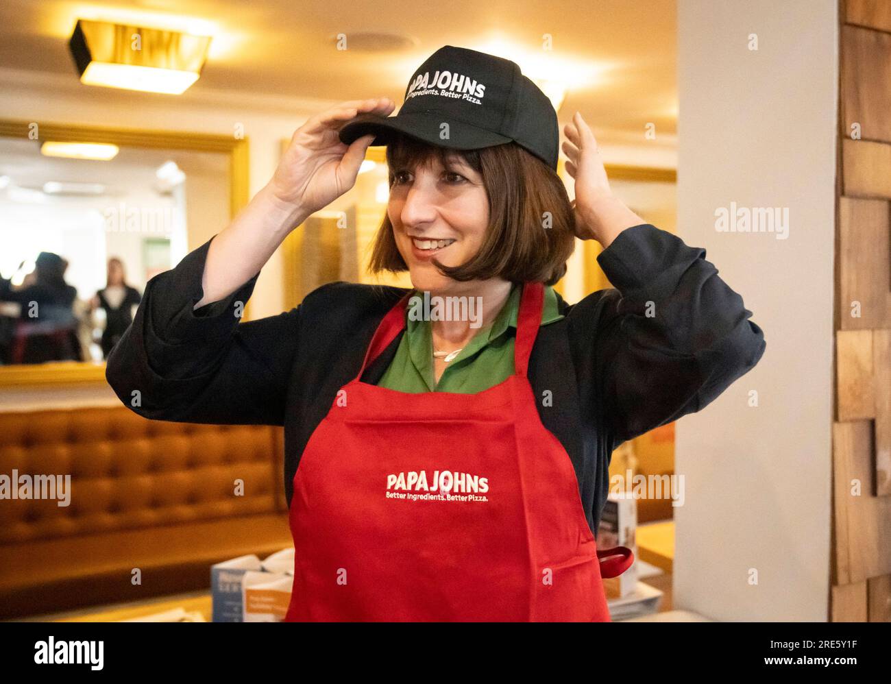 Shadow chancellor Rachel Reeves dons a Papa Johns uniform ahead of ...