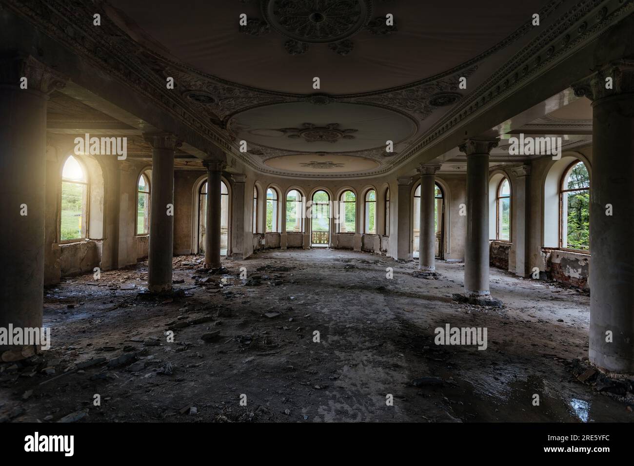 Large hall with columns in old abandoned mansion Stock Photo - Alamy