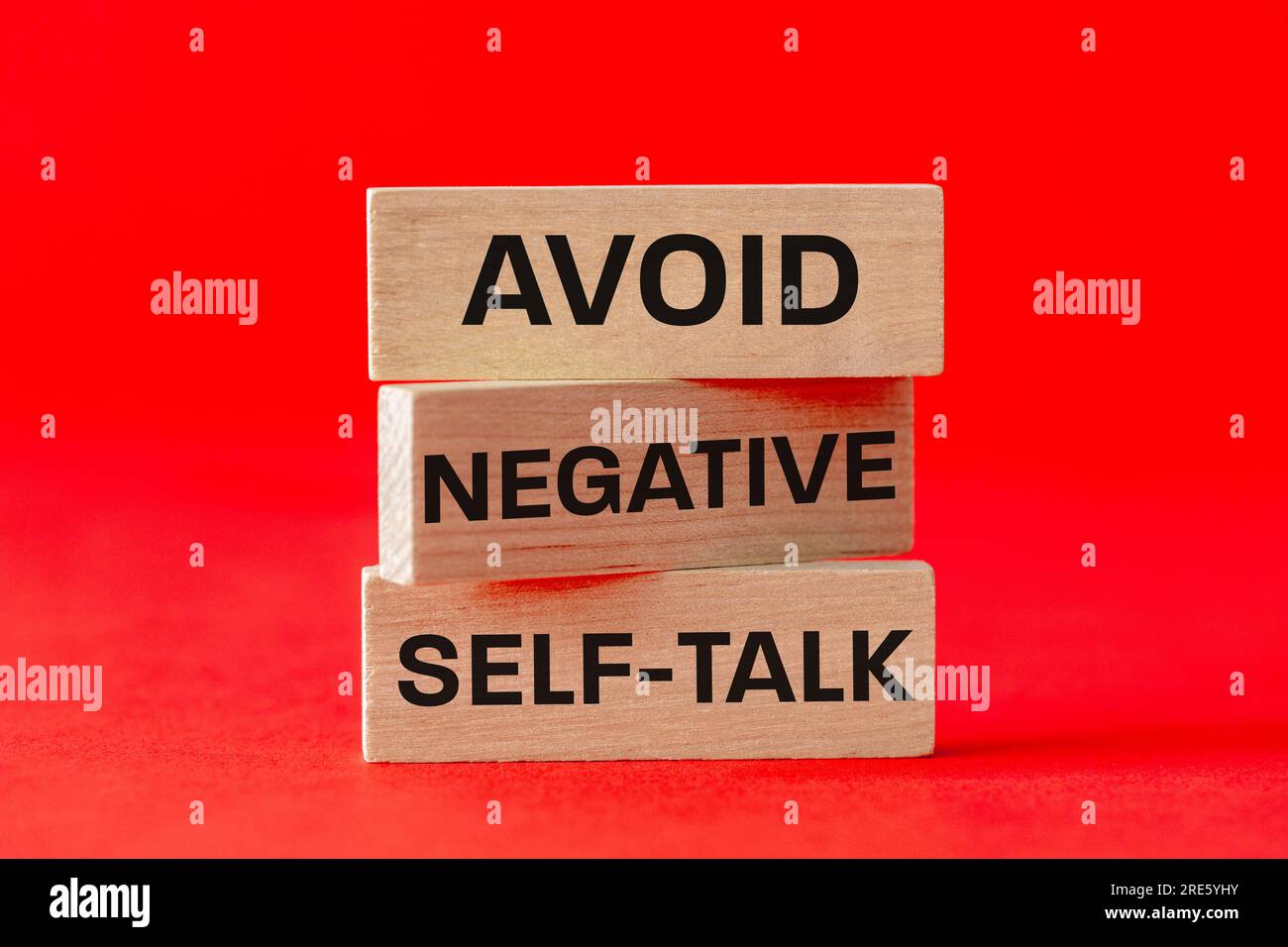 Avoid negative self development symbol, concept text on wooden blocks ...