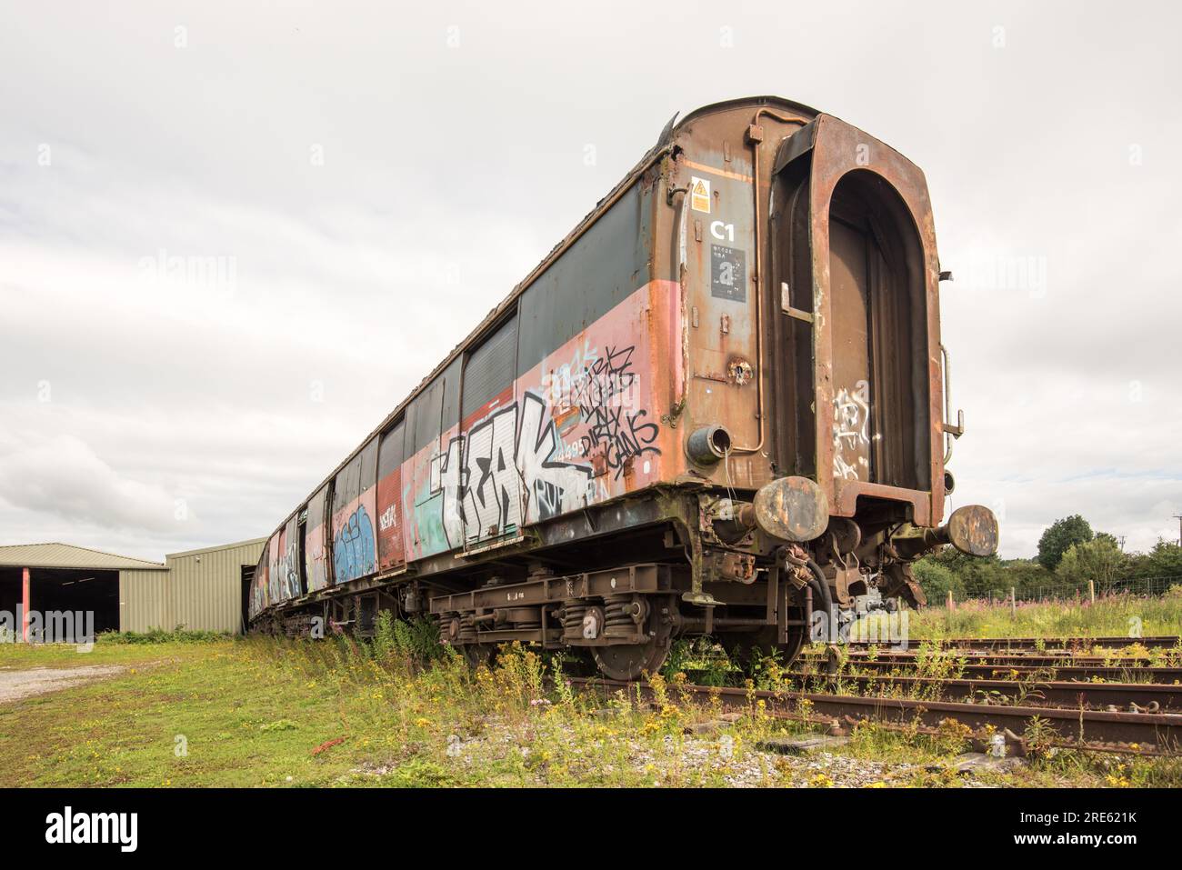 Abandoned and deteriorating railway carriages at Hellifield station in ...