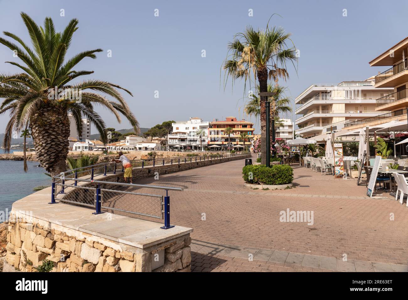 Cala Ratjada seafront promenade lined with restaurants and bars ...