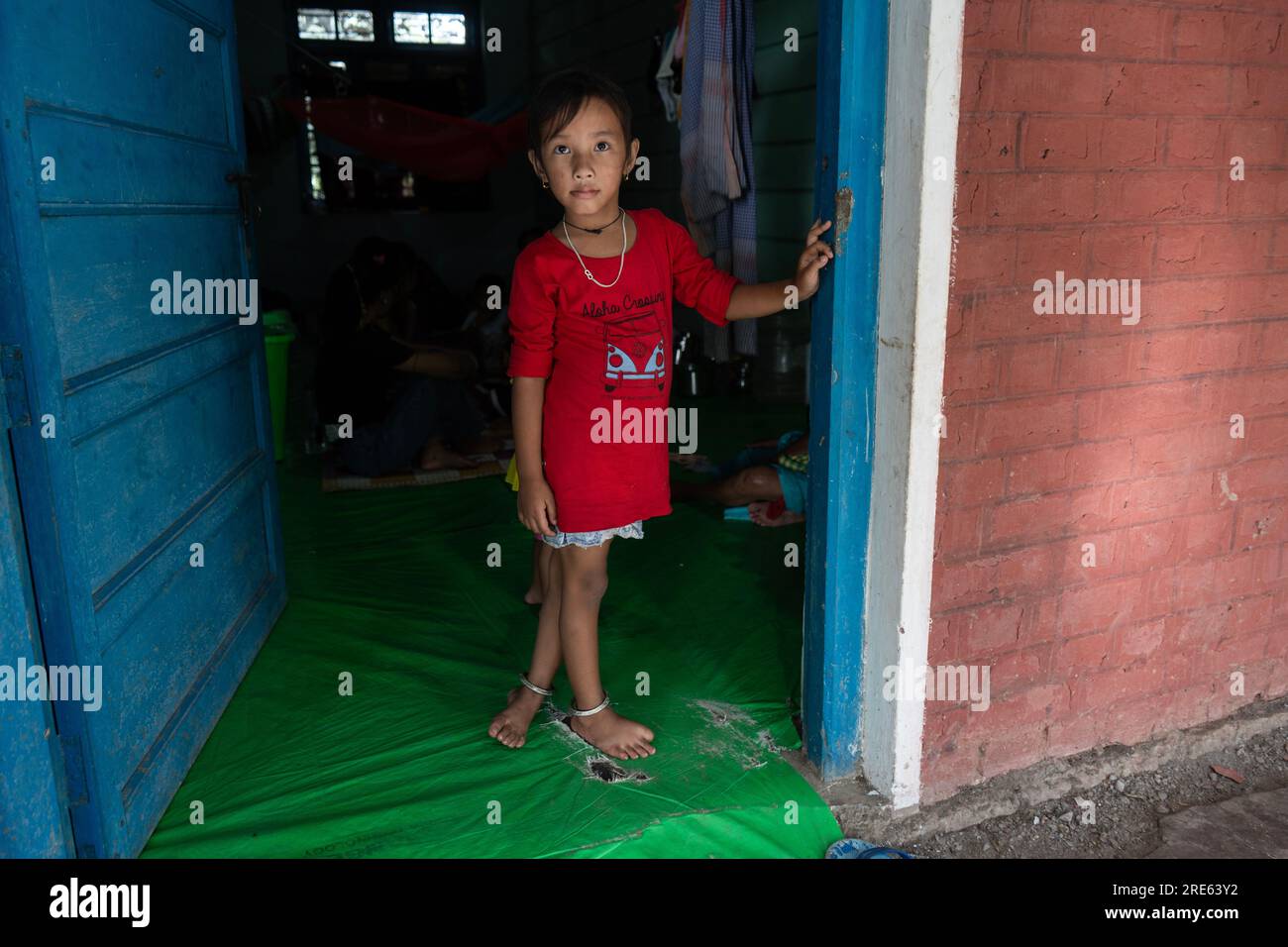 Meitei community man stays in a makeshift shelter after a mob burn ...
