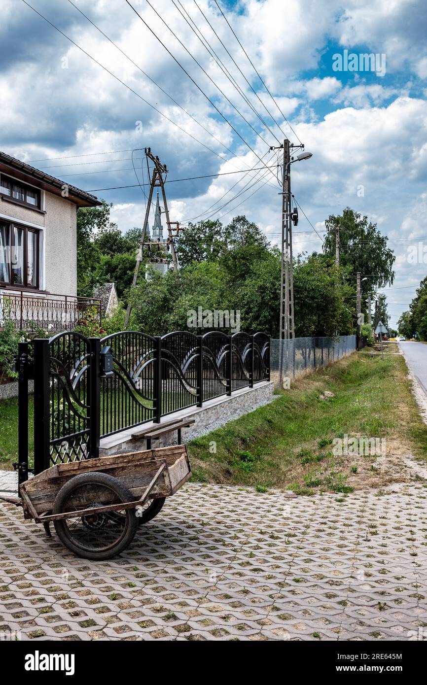 One single empty Polish village road, no cars, rural area community ...