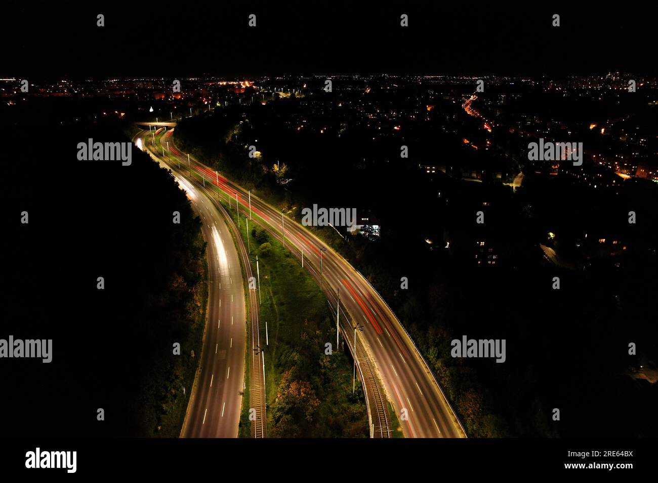 Top down view to road. Romantic night aerial photo of cars traveling ...