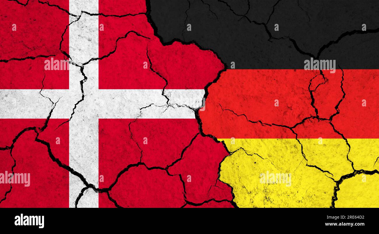 Flags of Denmark and Germany on cracked surface - politics ...