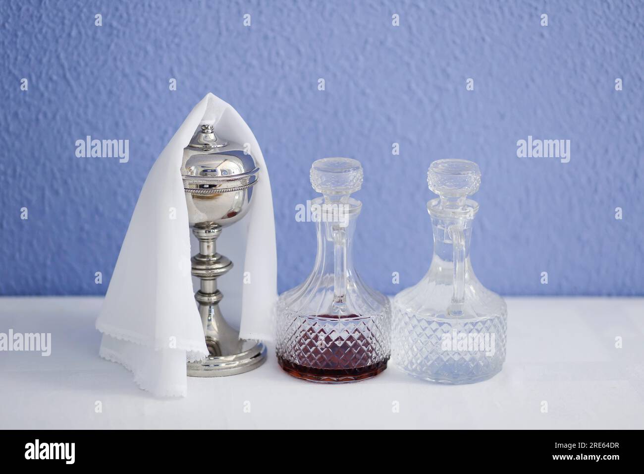 cruets with water and wine and chalice - religious objects Stock Photo ...