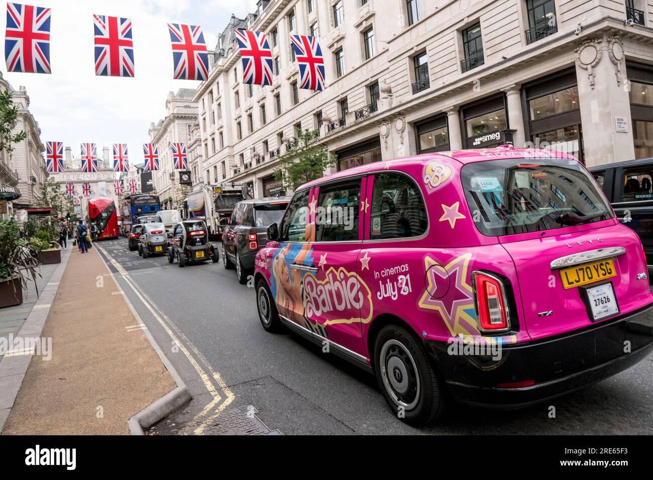 Barbie taxi driving down Regents Street in London to promote the new ...