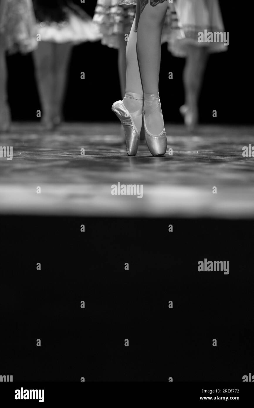 Ballerina on a scene on her toes. Ballet, dancer performing on a scene ...