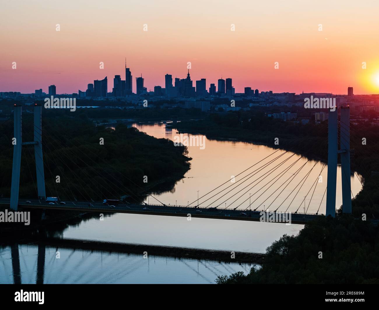 Warsaw skyline and Vistula river against moody sunset, aerial landscape ...