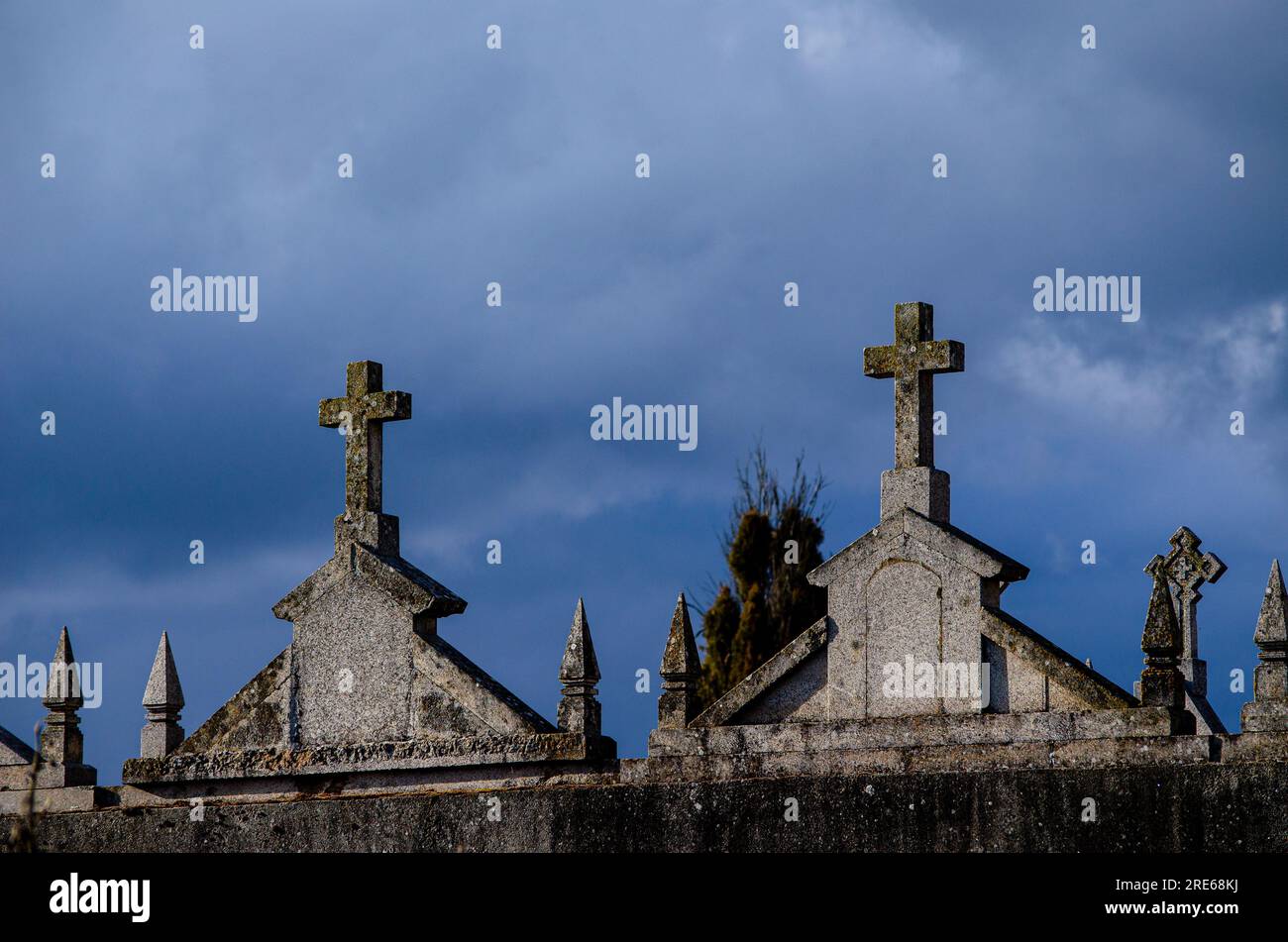 tombs with crosses on top in a catholic cemetery Stock Photo - Alamy