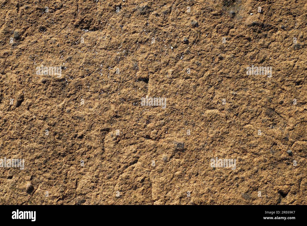 Simple mineral rock surface background, high contrast side sunset light ...