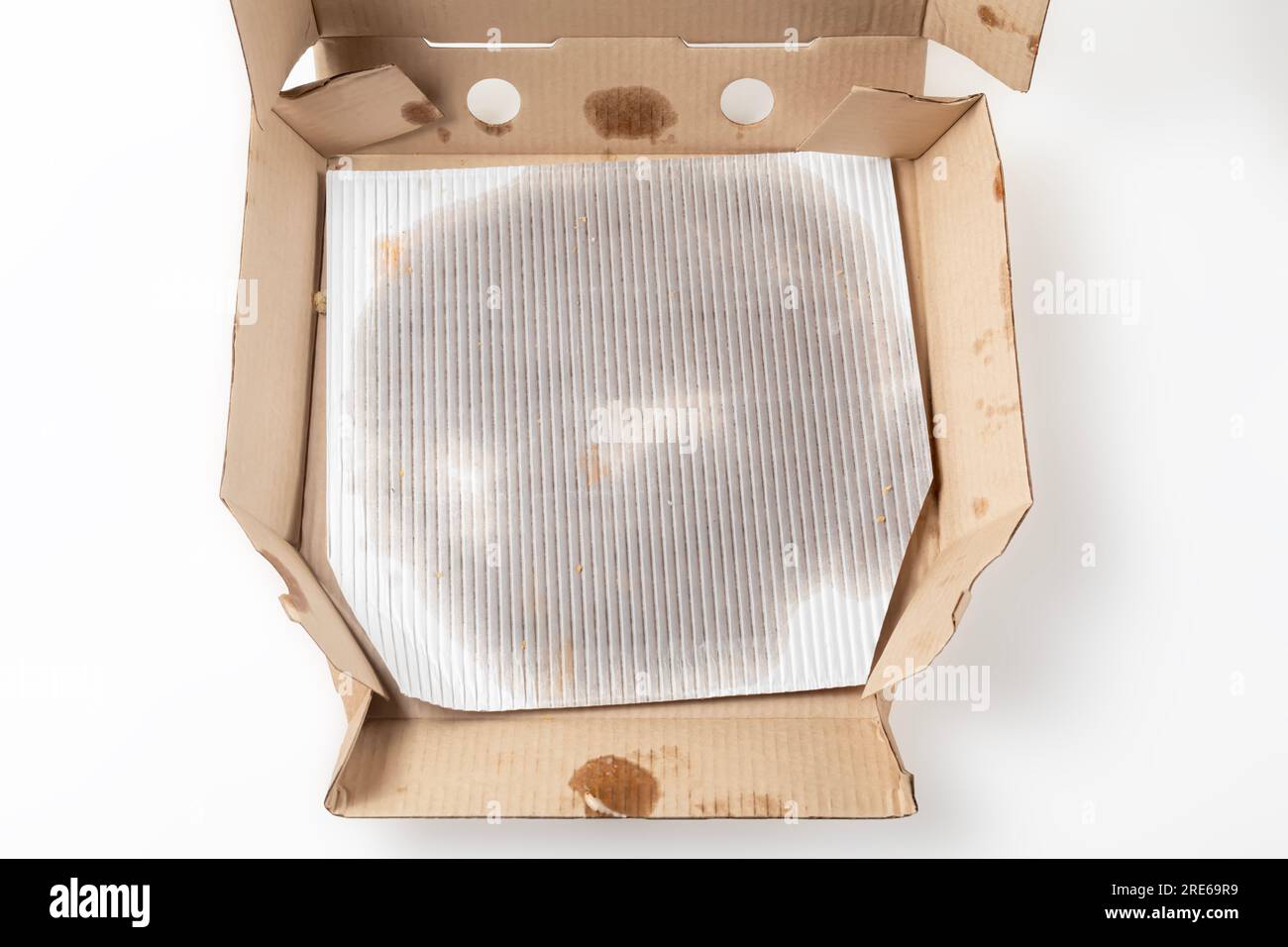 Empty pizza box with grease stains isolated on white. Top view Stock ...