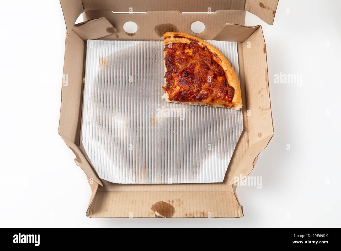 Margherita pizza with a slice isolated on a cardboard open box Stock ...