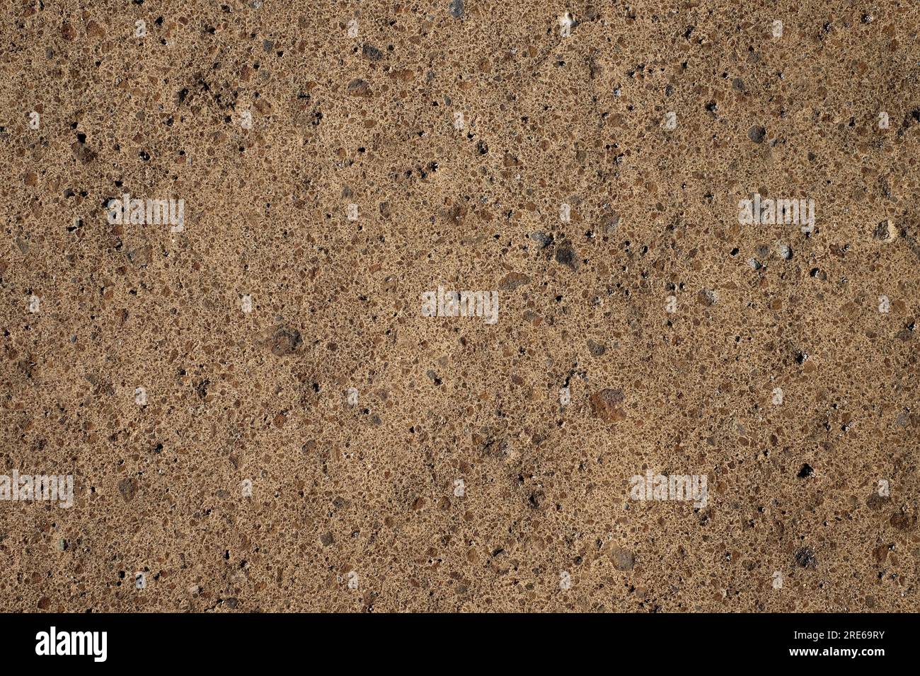 Simple mineral rock surface background, subdued brown and green tones ...