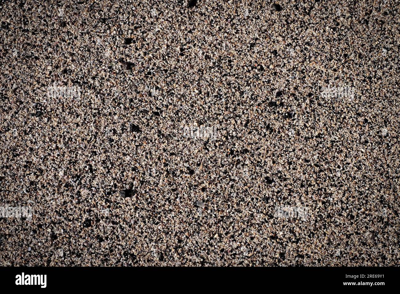 Coarse sand grains and small pebbles, finely ground minerals on an ...