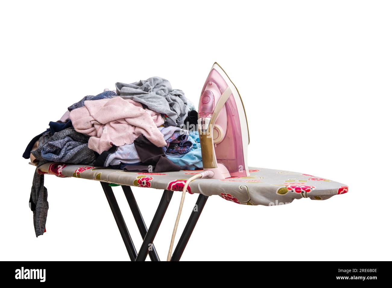 Stacked clothes for ironing on a white isolated background Stock Photo ...