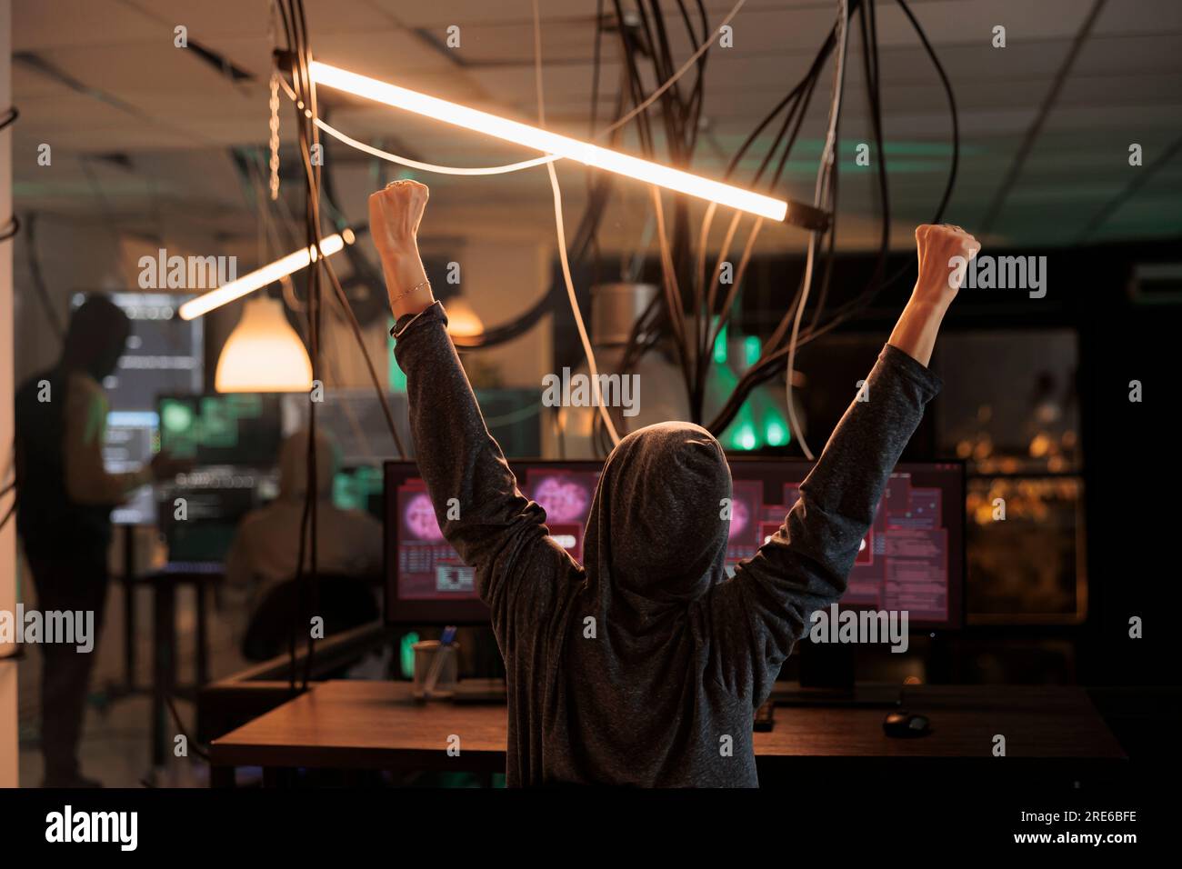 Happy thief celebrating security breach and hacking computer system ...