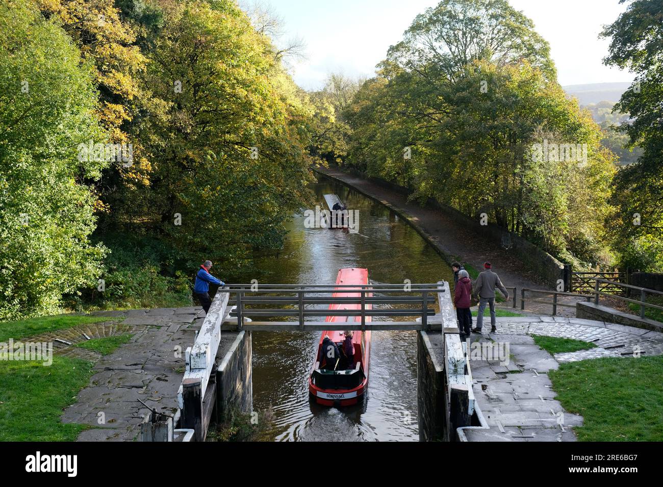 Canal boat exiting Bingley Five Rise locks, West Yorkshire Stock Photo ...