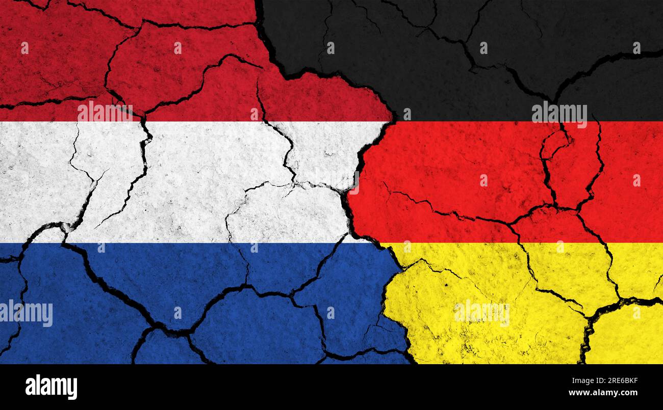 Flags of Netherlands and Germany on cracked surface - politics ...