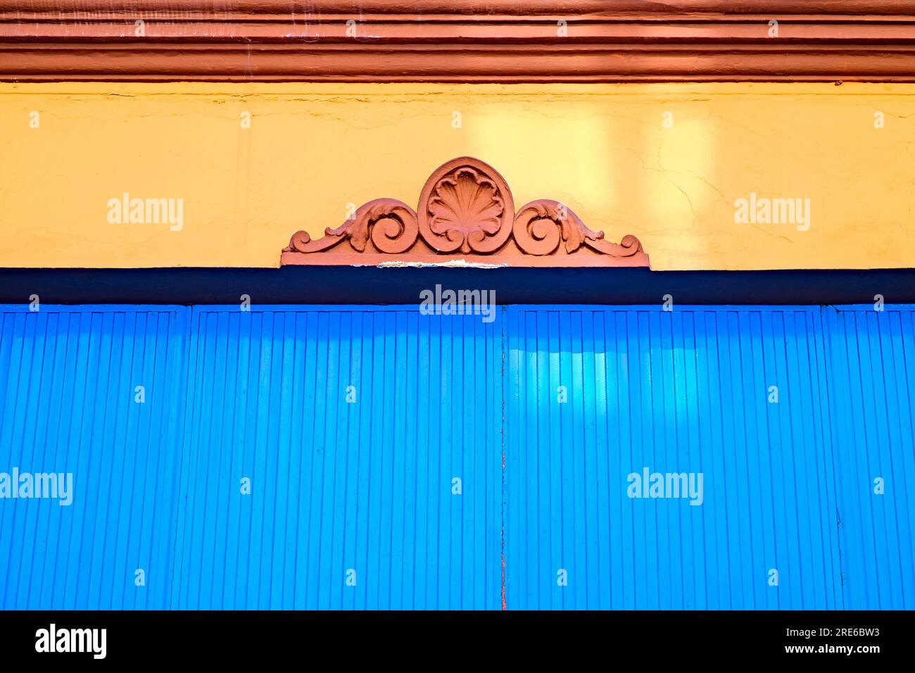 Brown decorative clam shell element on a colorful facade Stock Photo ...