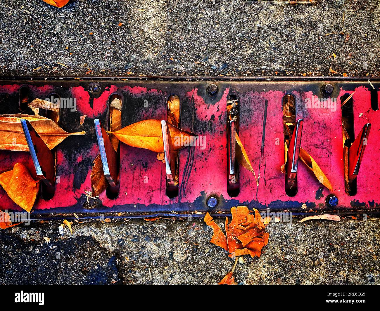 One way traffic spike strip in a parking lot Stock Photo - Alamy