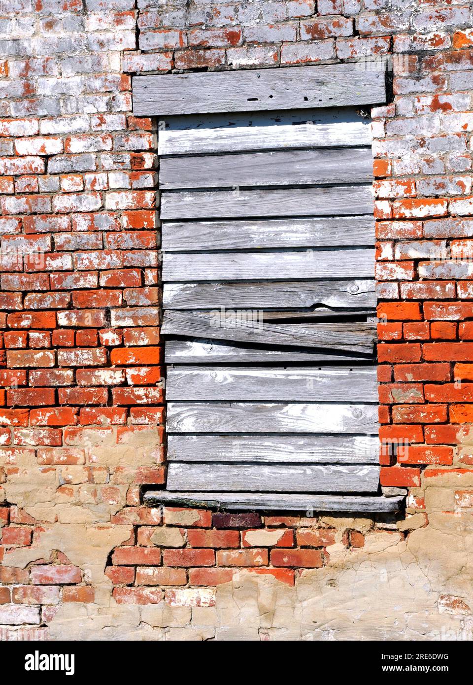 Background image shows an old brick building smeared with mortar. Lone ...