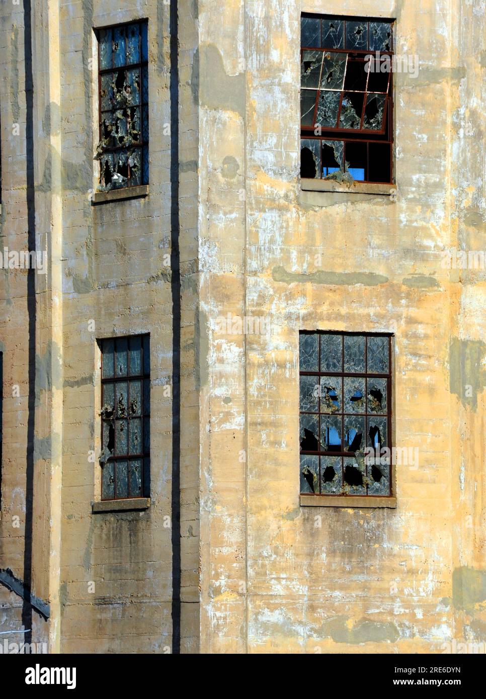 Windows on an old abandoned building, in Texas, are broken and ...