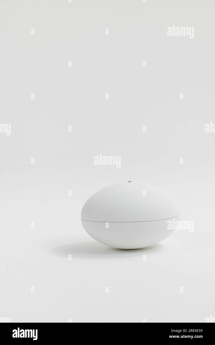 White rugby ball with copy space on white background Stock Photo - Alamy