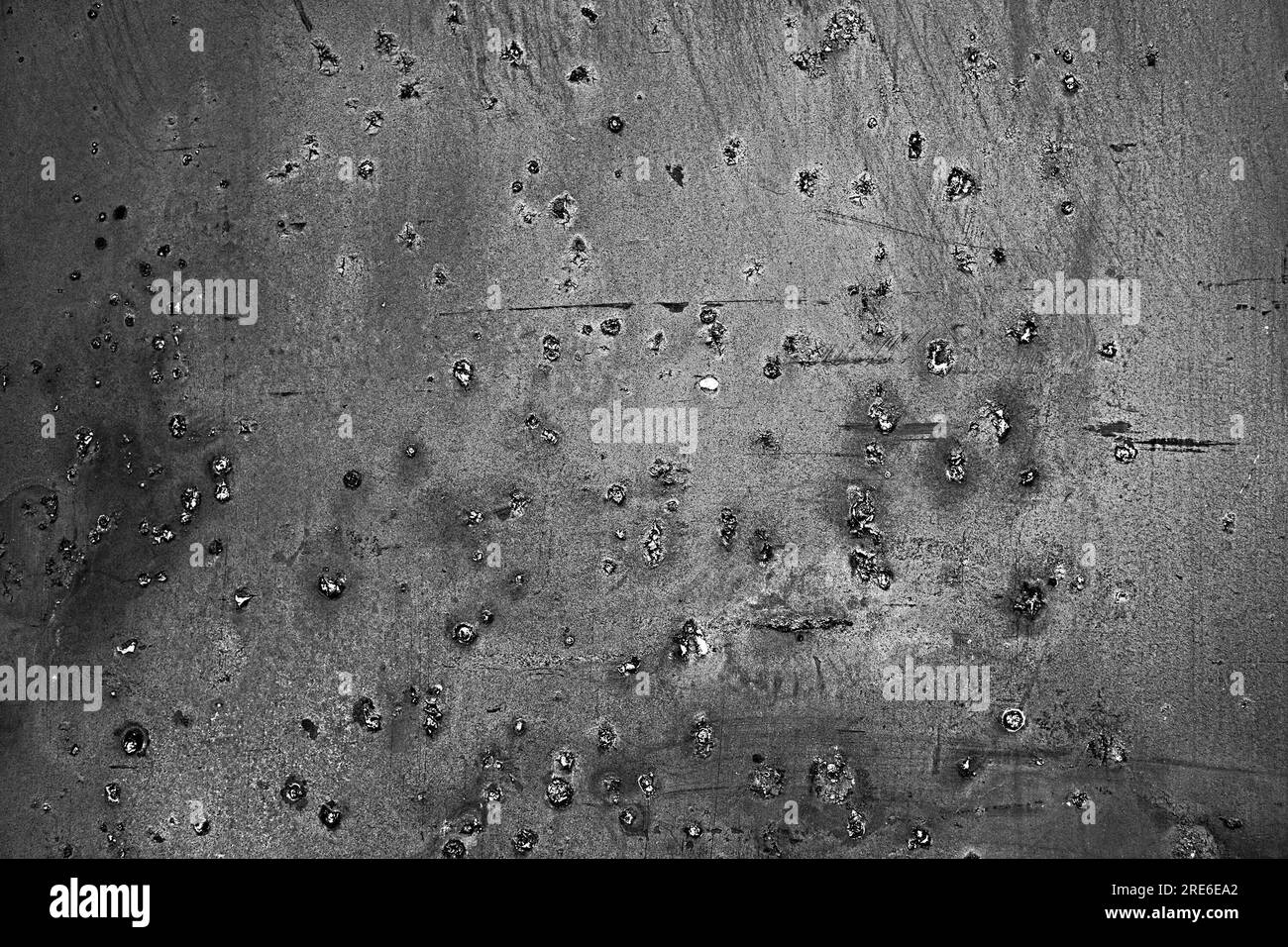 Empty surface in various shades of gray, with irregular blotches ...