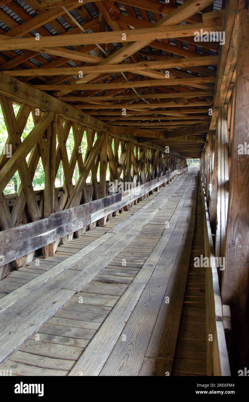 View inside the Clarkson Covered bridge shows trusses and floor joists ...