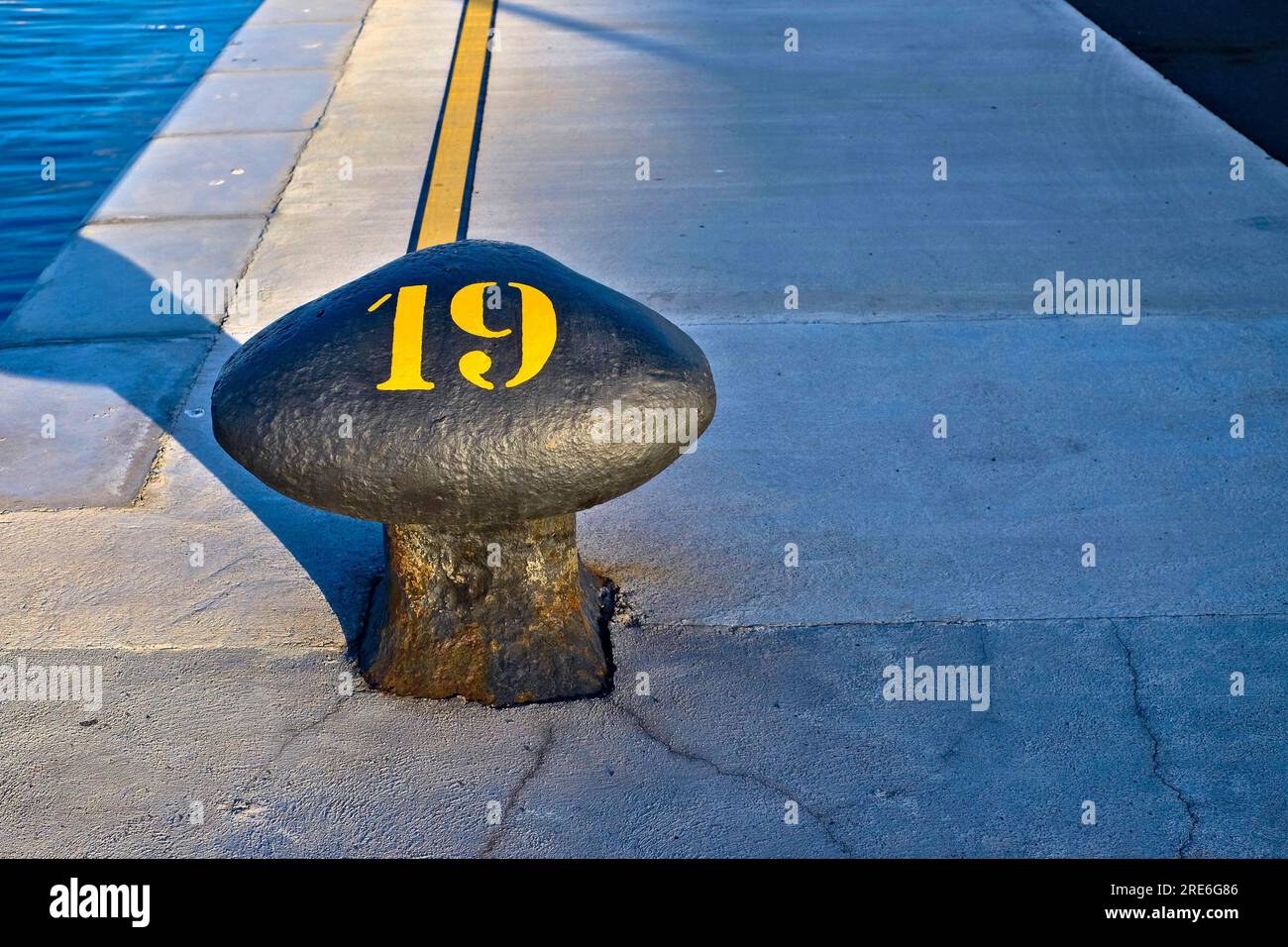 Number 19, nineteen, stencil yellow digit painted on a big commercial ...