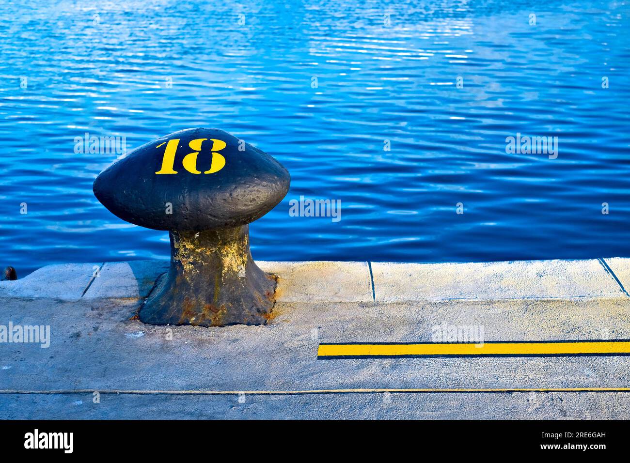 Number 18, eighteen, stencil yellow digit painted on a big commercial ...