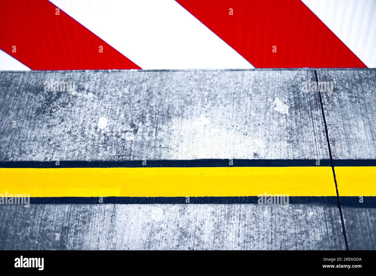 Abstract detail of road signage, red and white direction indicators and ...