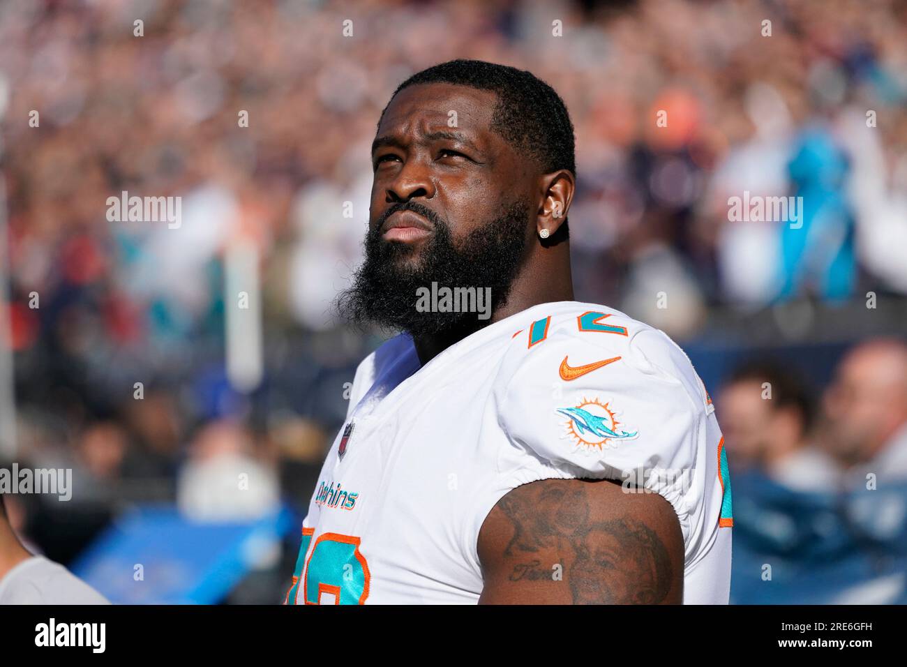 FILE - Miami Dolphins offensive tackle Terron Armstead looks at the scoreboard during an NFL ...