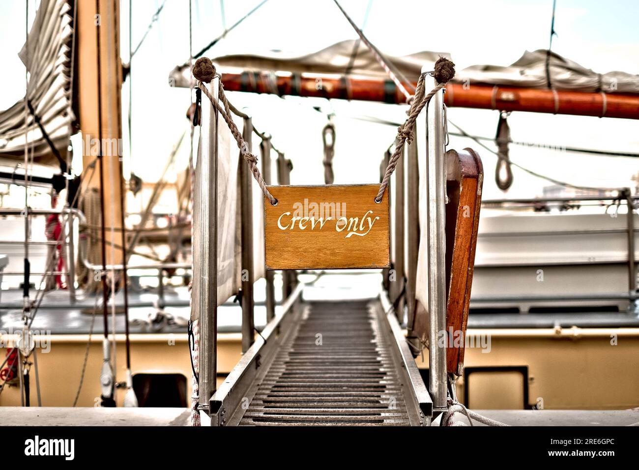 Gangway leading to a deck of a classic sailing ship, 'Crew only' sign ...