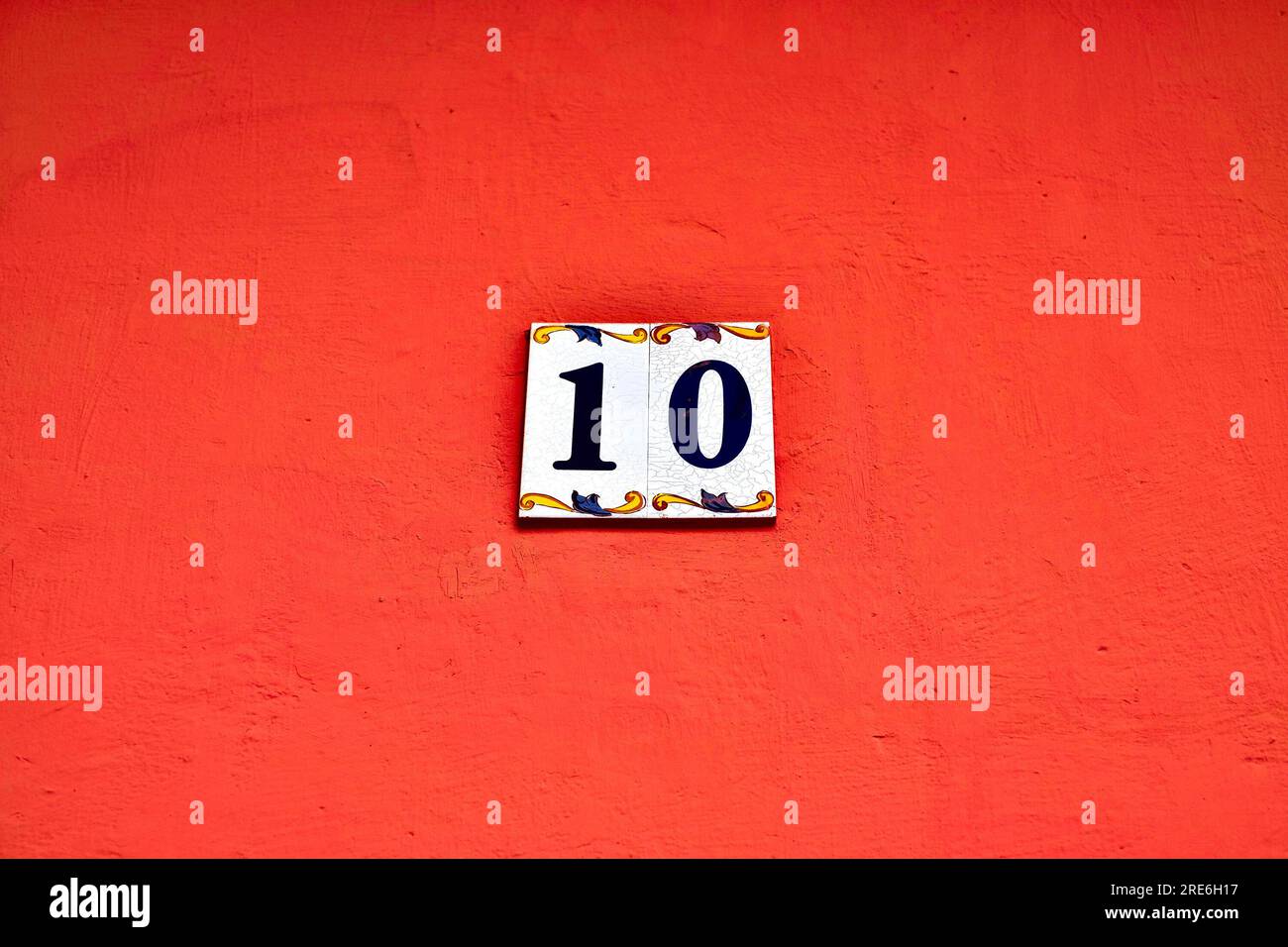 Number 10, ten, dark digits on tiles, vibrant red background Stock ...