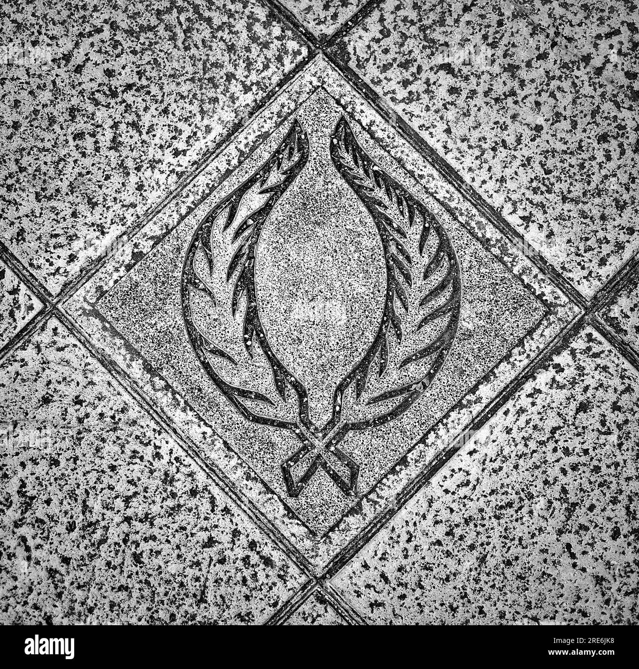 Laurel wreath, symbol of triumph and glory, a decorative relief in a ...