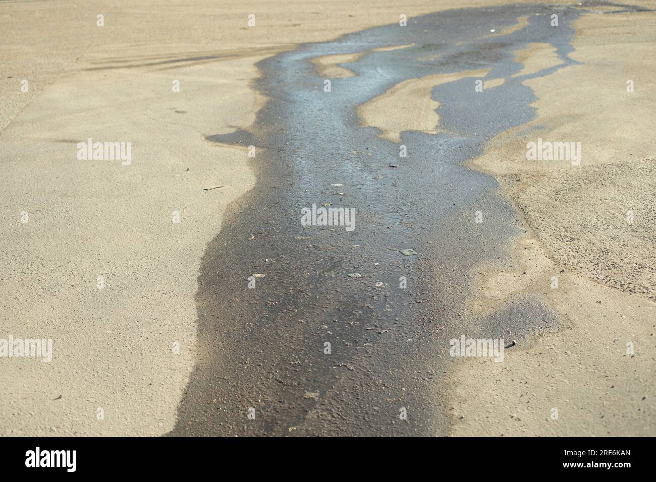 Puddle on asphalt. Wet road. Dirty asphalt. Dirt on road Stock Photo ...